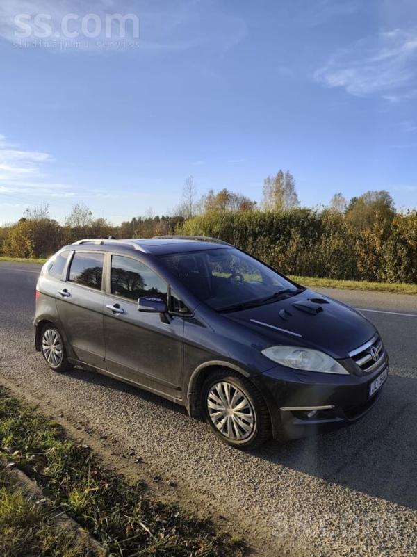 Blue Honda FR-V 2006 in Rezekne, with an engine capacity of 2.20 L and mileage of 300 thousand km for 1100 €, photo 4 on AUTOMOTO.COM.LV