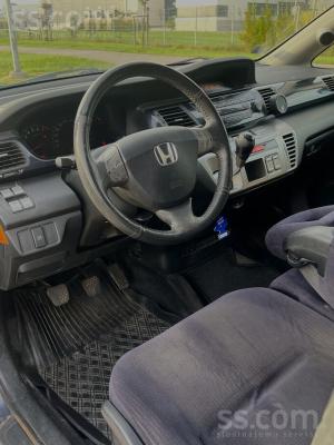Pelēks Honda FR-V 2008 Rīga, ar dzinēja tilpumu 1.80 L un nobraukumu 318 tūkst. km par 1500 €, foto 9 vietnē AUTOMOTO.COM.LV