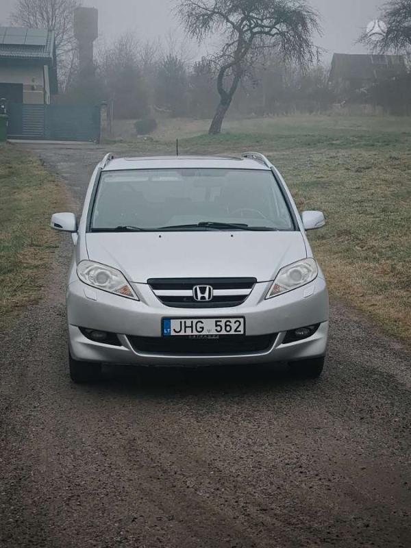Grey Honda FR-V 2005 in Vilnius, with an engine capacity of 2.00 L and mileage of 218 thousand km for 1450 €, photo 1 on AUTOMOTO.COM.LV