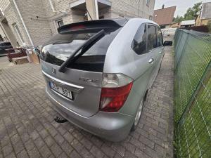 Grey Honda FR-V 2006 in Panevezys, with an engine capacity of 2.20 L and mileage of 348 thousand km for 999 €, photo 4 on AUTOMOTO.COM.LV