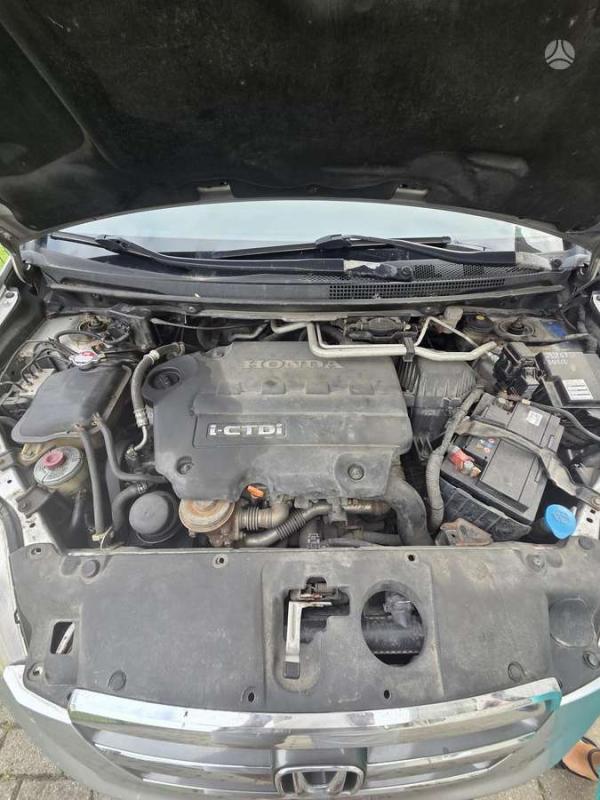 Grey Honda FR-V 2006 in Panevezys, with an engine capacity of 2.20 L and mileage of 348 thousand km for 999 €, photo 5 on AUTOMOTO.COM.LV