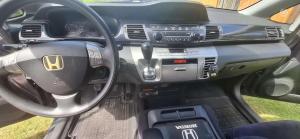 Grey Honda FR-V 2008 in Vilnius, with an engine capacity of 1.80 L and mileage of 238 thousand km for 2850 €, photo 6 on AUTOMOTO.COM.LV