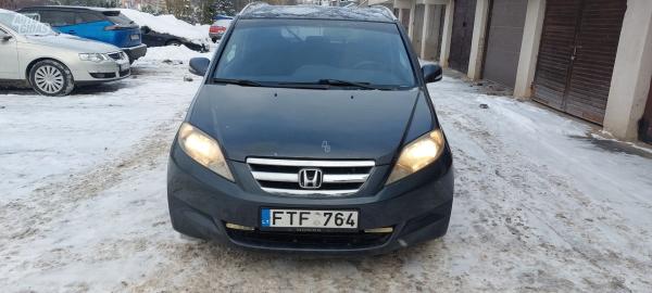 Grey Honda FR-V 2005 in Vilnius, with an engine capacity of 2.20 L and mileage of 330 thousand km for 590 €, photo 1 on AUTOMOTO.COM.LV