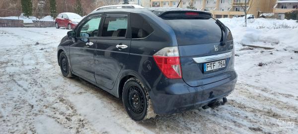 Grey Honda FR-V 2005 in Vilnius, with an engine capacity of 2.20 L and mileage of 330 thousand km for 590 €, photo 6 on AUTOMOTO.COM.LV
