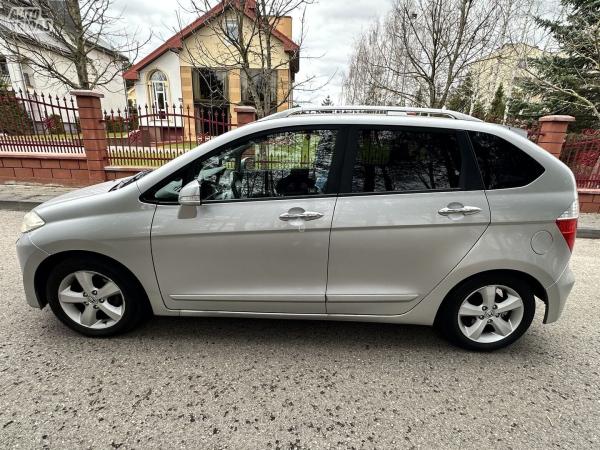 Grey Honda FR-V 2006 in Vilnius, with an engine capacity of 2.20 L and mileage of 295 thousand km for 2200 €, photo 6 on AUTOMOTO.COM.LV
