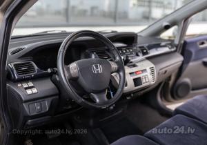 Grey Honda FR-V 2007 in Tallinn, with an engine capacity of 1.80 L and mileage of 180 thousand km for 3399 €, photo 12 on AUTOMOTO.COM.LV