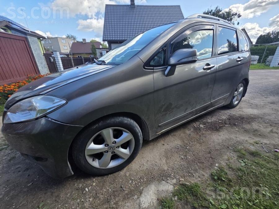 Grey Honda FR-V 2007 in Jelgava, with an engine capacity of 1.80 L and mileage of 254 thousand km for 980 €, photo 3 on AUTOMOTO.COM.LV