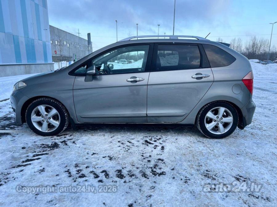 Grey Honda FR-V 2008 in Tallinn, with an engine capacity of 1.80 L and mileage of 245 thousand km for 1199 €, photo 6 on AUTOMOTO.COM.LV