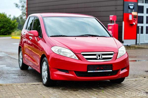 Red Honda FR-V 2005 in Kretinga, with an engine capacity of 2.20 L and mileage of 233 thousand km for 2650 €, photo 3 on AUTOMOTO.COM.LV
