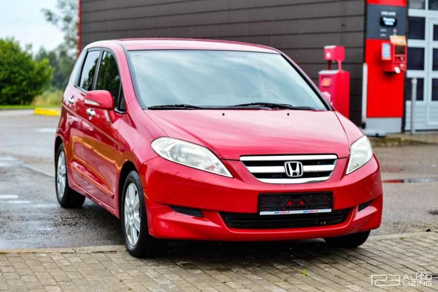 Red Honda FR-V 2005 in Kretinga, with an engine capacity of 2.20 L and mileage of 233 thousand km for 2650 €, photo 3 on AUTOMOTO.COM.LV