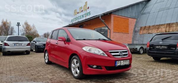 Red Honda FR-V 2006 in Valmiera, with an engine capacity of 2.00 L and mileage of 252 thousand km for 1650 €, photo 1 on AUTOMOTO.COM.LV