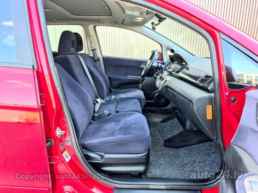 Red Honda FR-V 2007 in Tallinn, with an engine capacity of 1.80 L and mileage of 196 thousand km for 1890 €, photo 8 on AUTOMOTO.COM.LV