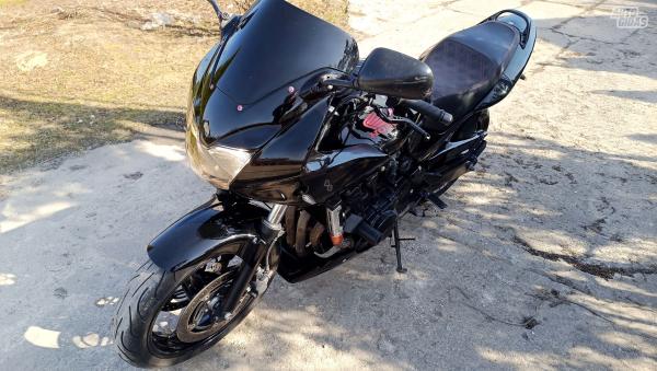 Melns Honda Hornet 2002 Druskininkai, ar dzinēja tilpumu 0.60 L un nobraukumu 33 tūkst. km par 1800 €, foto 3 vietnē AUTOMOTO.COM.LV