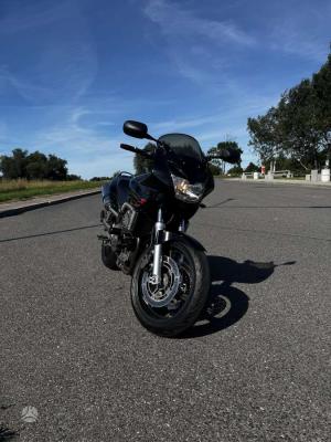 Melns Honda Hornet 2003 Klaipėda, ar dzinēja tilpumu 0.60 L un nobraukumu 20 tūkst. km par 1600 €, foto 6 vietnē AUTOMOTO.COM.LV