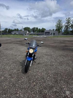Zils Honda Hornet 2004 Panevēža, ar dzinēja tilpumu 0.90 L un nobraukumu 60 tūkst. km par 2300 €, foto  vietnē AUTOMOTO.COM.LV