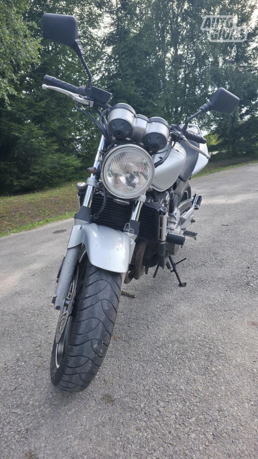 Pelēks Honda Hornet 2004 Biržai, ar dzinēja tilpumu 0.60 L un nobraukumu 63 tūkst. km par 1550 €, foto 4 vietnē AUTOMOTO.COM.LV