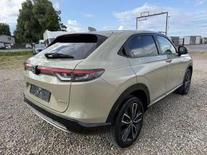 Brown Honda HR-V 2022 in Vilnius, with an engine capacity of 1.50 L and mileage of 121 thousand km for 22700 €, photo 7 on AUTOMOTO.COM.LV