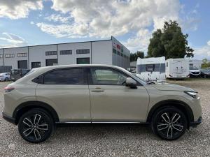 Brown Honda HR-V 2022 in Vilnius, with an engine capacity of 1.50 L and mileage of 121 thousand km for 22700 €, photo 9 on AUTOMOTO.COM.LV
