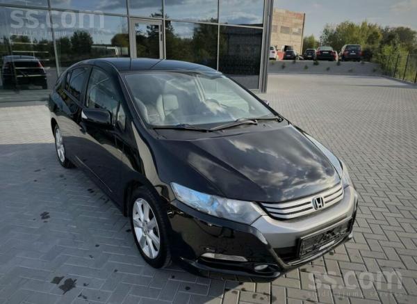 Black Honda Insight 2009 in Telschi, with an engine capacity of 1.40 L and mileage of 251 thousand km for 4299 €, photo 1 on AUTOMOTO.COM.LV
