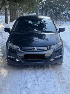 Black Honda Insight 2009 in Vilnius, with an engine capacity of 1.34 L and mileage of 274 thousand km for 1950 €, photo 2 on AUTOMOTO.COM.LV