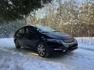 Black Honda Insight 2009 in Vilnius, with an engine capacity of 1.34 L and mileage of 274 thousand km for 1950 €, photo 3 on AUTOMOTO.COM.LV
