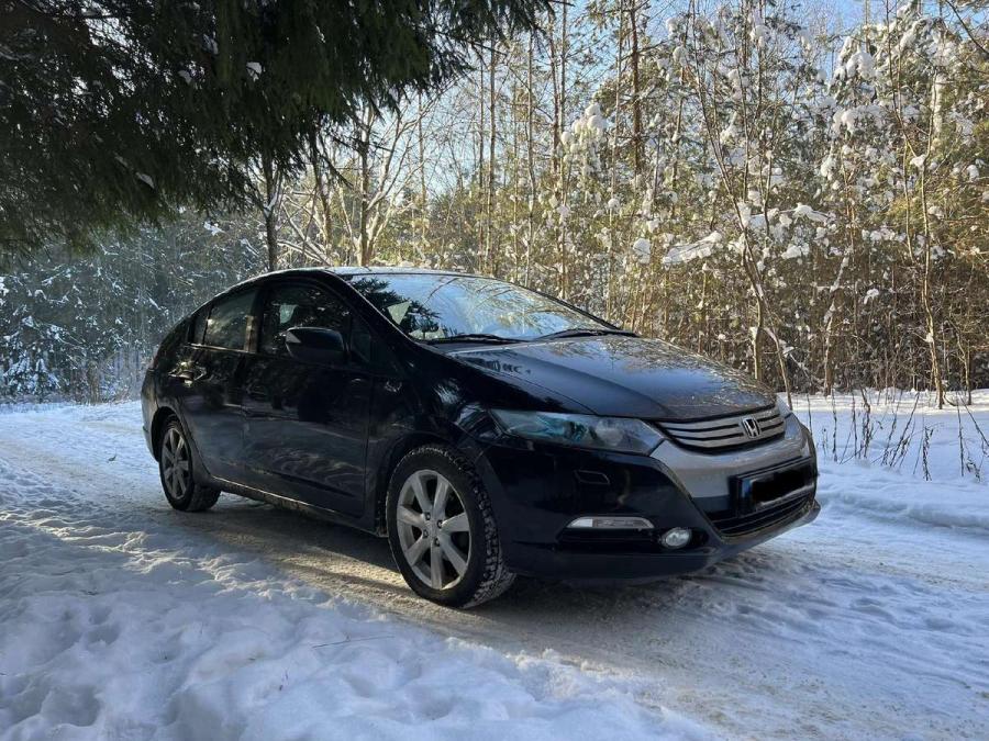 Black Honda Insight 2009 in Vilnius, with an engine capacity of 1.34 L and mileage of 274 thousand km for 1950 €, photo 3 on AUTOMOTO.COM.LV