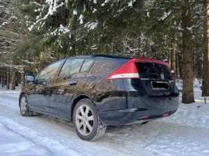 Black Honda Insight 2009 in Vilnius, with an engine capacity of 1.34 L and mileage of 274 thousand km for 1950 €, photo 7 on AUTOMOTO.COM.LV