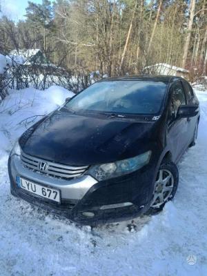Black Honda Insight 2009 in Vilnius, with an engine capacity of 1.34 L and mileage of 265 thousand km for 1500 €, photo 2 on AUTOMOTO.COM.LV