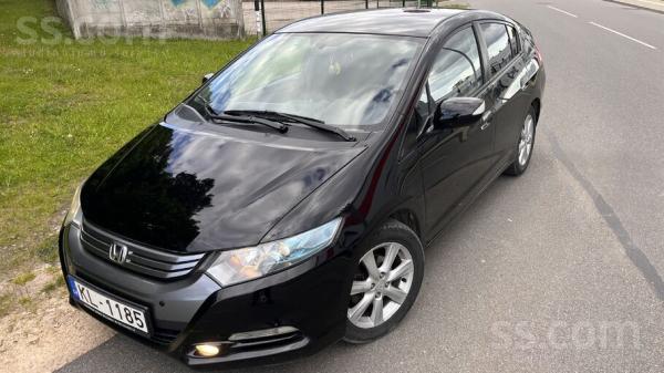 Melns Honda Insight 2010 Rīga, ar dzinēja tilpumu 1.30 L un nobraukumu 153 tūkst. km par 2850 €, foto 1 vietnē AUTOMOTO.COM.LV