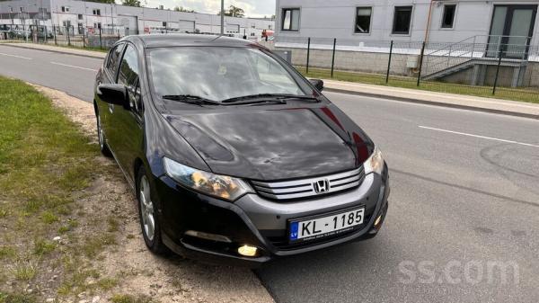 Melns Honda Insight 2010 Rīga, ar dzinēja tilpumu 1.30 L un nobraukumu 153 tūkst. km par 2850 €, foto 2 vietnē AUTOMOTO.COM.LV