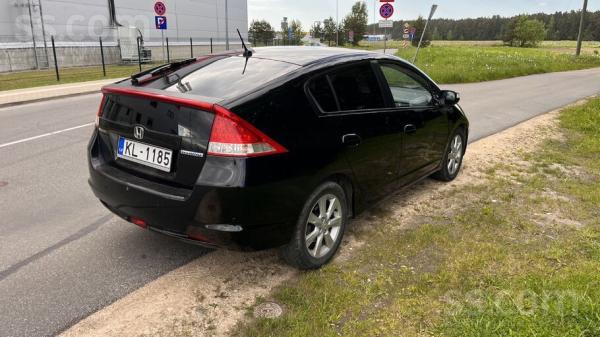 Melns Honda Insight 2010 Rīga, ar dzinēja tilpumu 1.30 L un nobraukumu 153 tūkst. km par 2850 €, foto 5 vietnē AUTOMOTO.COM.LV