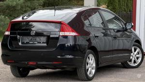 Black Honda Insight 2010 in Ukmerge, with an engine capacity of 1.34 L and mileage of 215 thousand km for 3750 €, photo 4 on AUTOMOTO.COM.LV