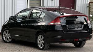 Black Honda Insight 2010 in Ukmerge, with an engine capacity of 1.34 L and mileage of 215 thousand km for 3750 €, photo 5 on AUTOMOTO.COM.LV
