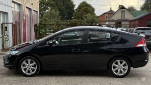 Black Honda Insight 2010 in Ukmerge, with an engine capacity of 1.34 L and mileage of 215 thousand km for 3750 €, photo 7 on AUTOMOTO.COM.LV