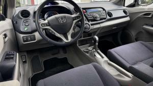 Black Honda Insight 2010 in Ukmerge, with an engine capacity of 1.34 L and mileage of 215 thousand km for 3750 €, photo 15 on AUTOMOTO.COM.LV