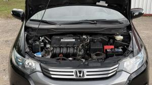 Black Honda Insight 2010 in Ukmerge, with an engine capacity of 1.34 L and mileage of 215 thousand km for 3750 €, photo 20 on AUTOMOTO.COM.LV