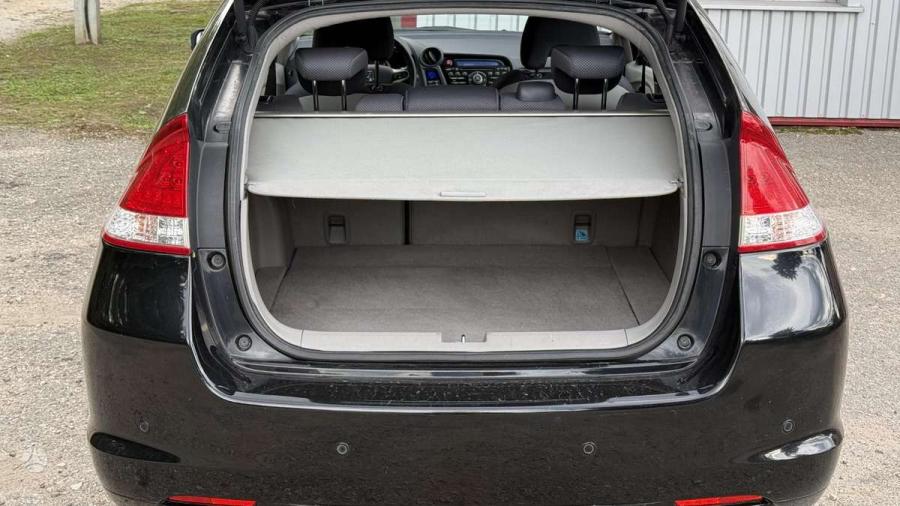 Black Honda Insight 2010 in Ukmerge, with an engine capacity of 1.34 L and mileage of 215 thousand km for 3750 €, photo 23 on AUTOMOTO.COM.LV