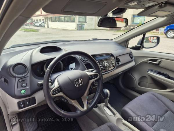 Melns Honda Insight 2010 Tallina, ar dzinēja tilpumu 1.30 L un nobraukumu 290 tūkst. km par 3999 €, foto 10 vietnē AUTOMOTO.COM.LV