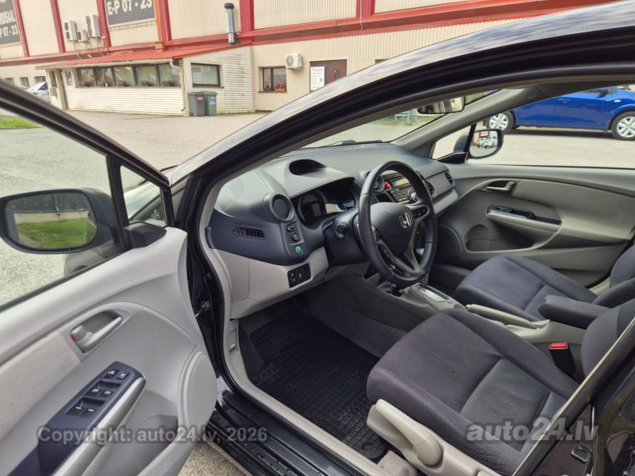 Black Honda Insight 2010 in Tallinn, with an engine capacity of 1.30 L and mileage of 290 thousand km for 3999 €, photo 11 on AUTOMOTO.COM.LV