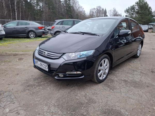Black Honda Insight 2011 in Radviliskis, with an engine capacity of 1.34 L and mileage of 212 thousand km for 4650 €, photo 1 on AUTOMOTO.COM.LV