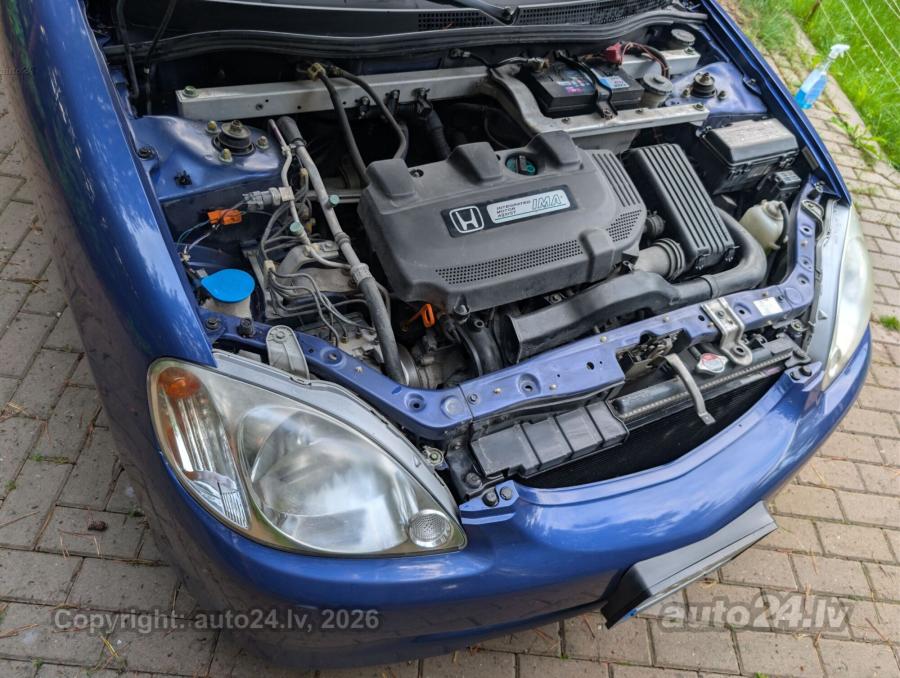 Zils Honda Insight 2001 Tallina, ar dzinēja tilpumu 1.00 L un nobraukumu 145 tūkst. km par 4500 €, foto 12 vietnē AUTOMOTO.COM.LV