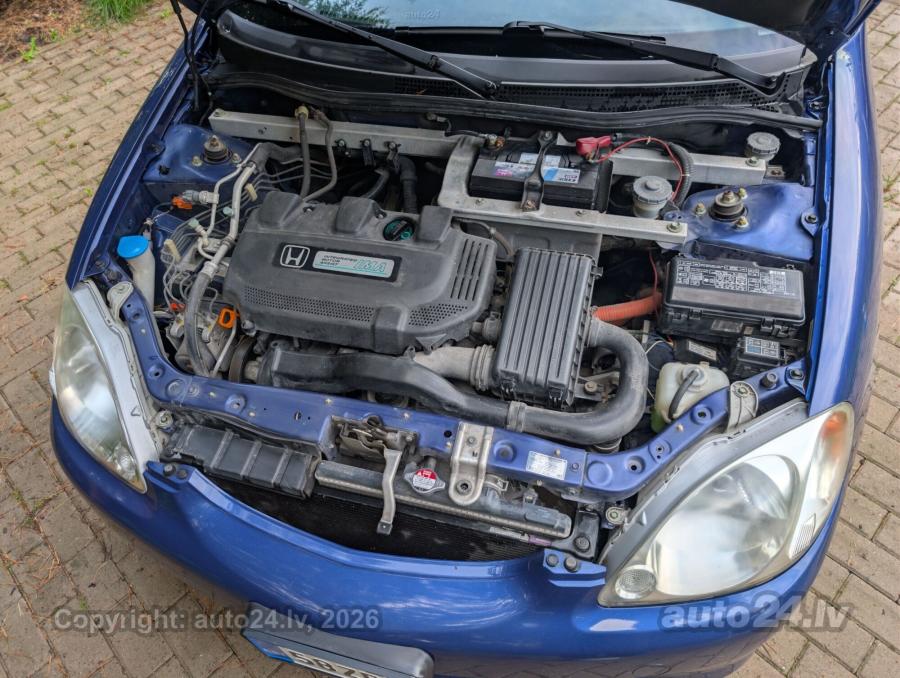 Zils Honda Insight 2001 Tallina, ar dzinēja tilpumu 1.00 L un nobraukumu 145 tūkst. km par 4500 €, foto 19 vietnē AUTOMOTO.COM.LV