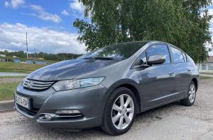 Brown Honda Insight 2010 in Vilnius, with an engine capacity of 1.34 L and mileage of 279 thousand km for 3750 €, photo 4 on AUTOMOTO.COM.LV