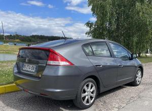 Brown Honda Insight 2010 in Vilnius, with an engine capacity of 1.34 L and mileage of 279 thousand km for 3750 €, photo 6 on AUTOMOTO.COM.LV