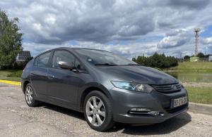 Brown Honda Insight 2010 in Vilnius, with an engine capacity of 1.34 L and mileage of 279 thousand km for 3650 €, photo 3 on AUTOMOTO.COM.LV