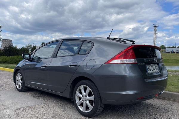 Brūns Honda Insight 2010 Viļņa, ar dzinēja tilpumu 1.34 L un nobraukumu 279 tūkst. km par 3650 €, foto 4 vietnē AUTOMOTO.COM.LV