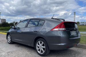 Brown Honda Insight 2010 in Vilnius, with an engine capacity of 1.34 L and mileage of 279 thousand km for 3650 €, photo 5 on AUTOMOTO.COM.LV