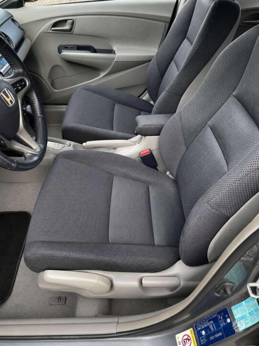 Brown Honda Insight 2010 in Vilnius, with an engine capacity of 1.34 L and mileage of 279 thousand km for 3650 €, photo 9 on AUTOMOTO.COM.LV