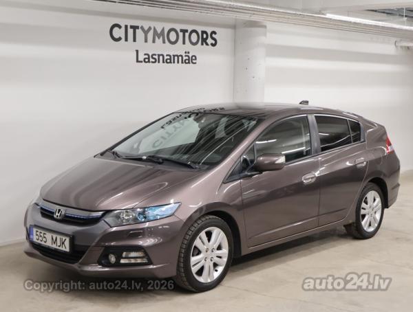 Brown Honda Insight 2014 in Tallinn, with an engine capacity of 1.30 L and mileage of 139 thousand km for 6900 €, photo 1 on AUTOMOTO.COM.LV