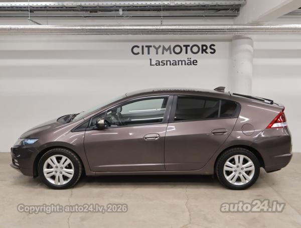 Brown Honda Insight 2014 in Tallinn, with an engine capacity of 1.30 L and mileage of 139 thousand km for 6900 €, photo 2 on AUTOMOTO.COM.LV